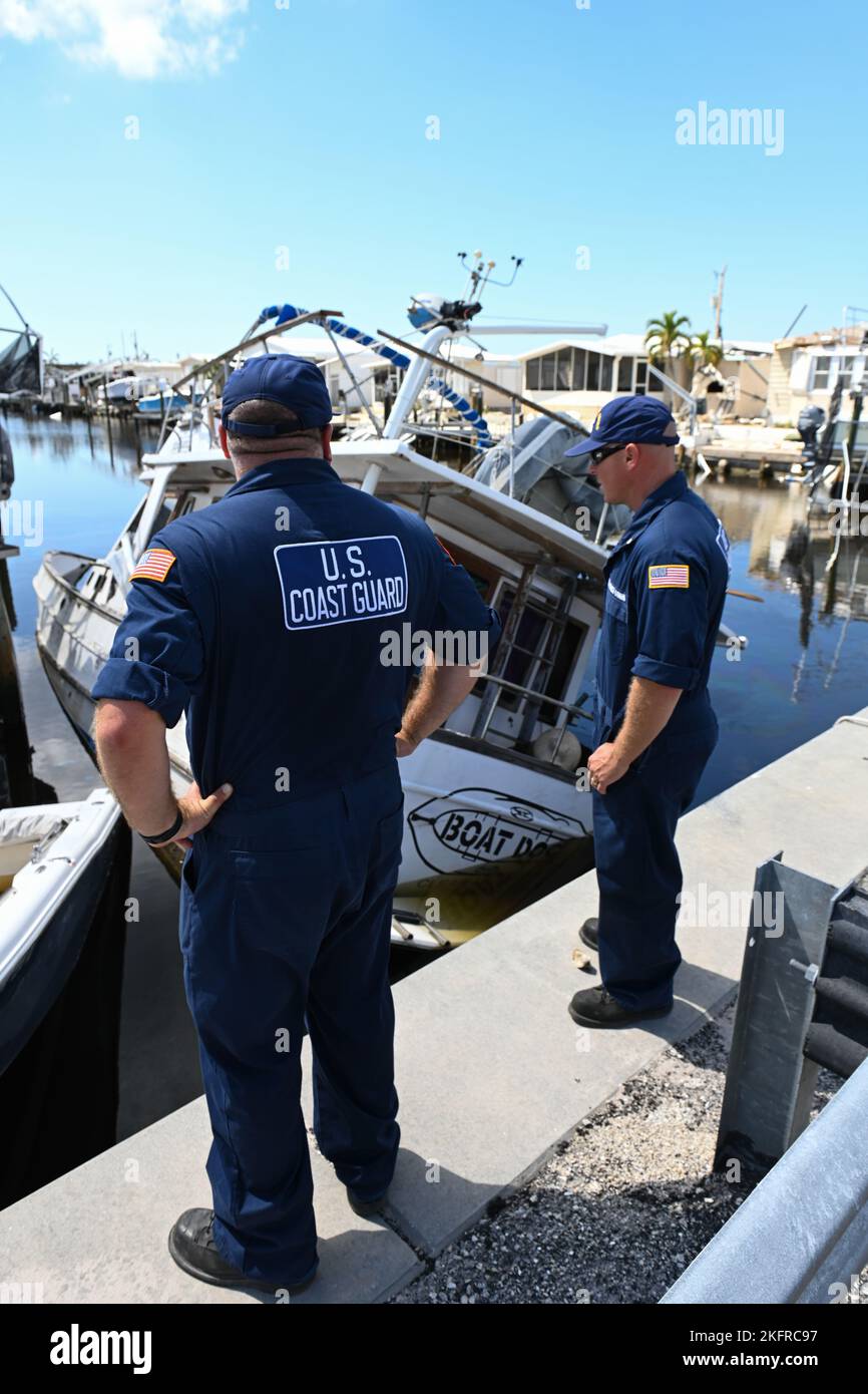 U.S. Coast Guard Petty Officer 1st Class Dylan Zechman and Petty ...
