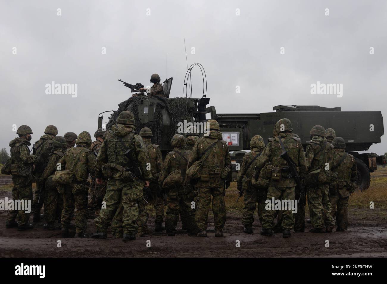 U.S. Marines with 3d Battalion, 12th Marines and members of the ...