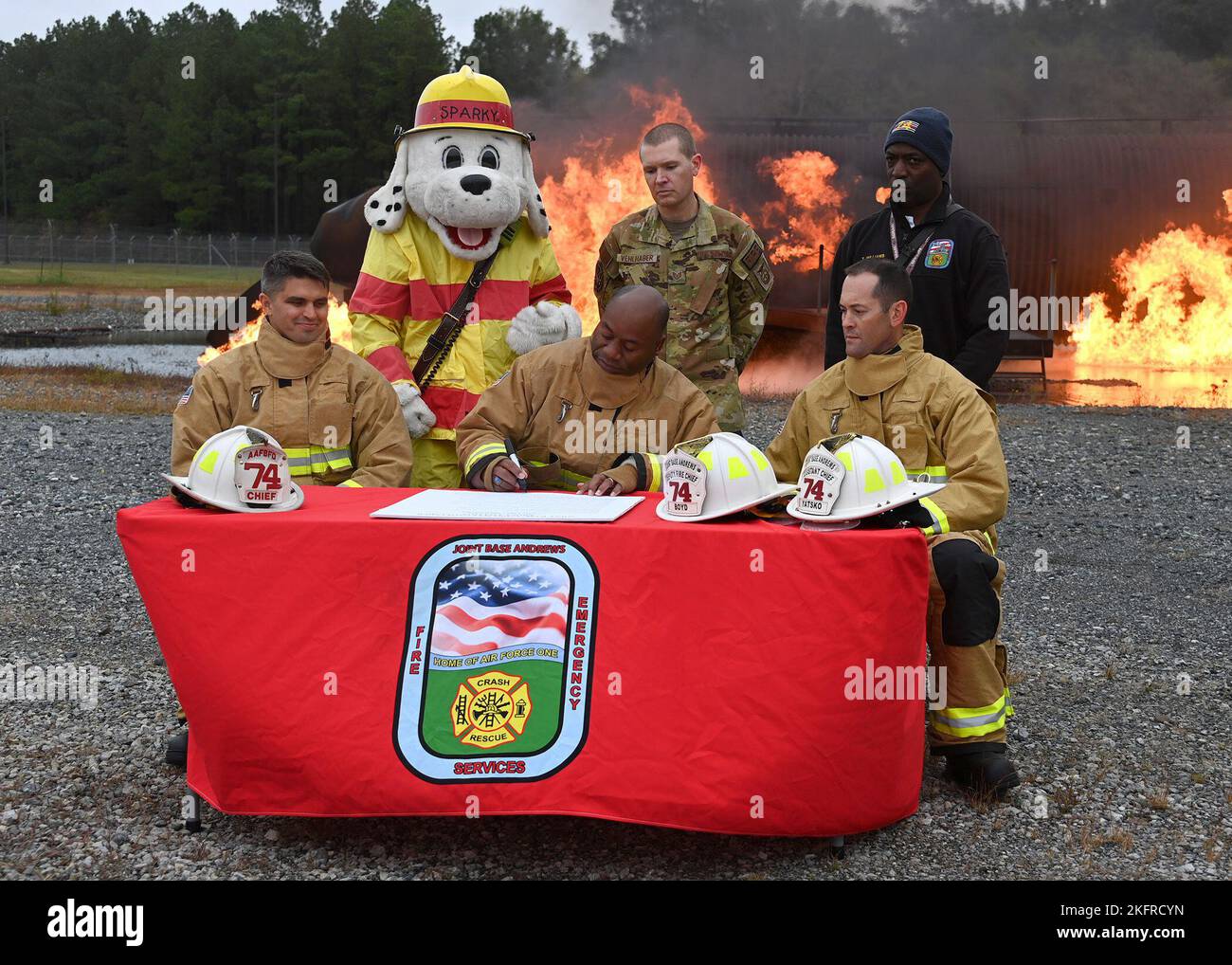 Col. Todd Randolph, 316th Wing and installation commander, signs a Fire ...
