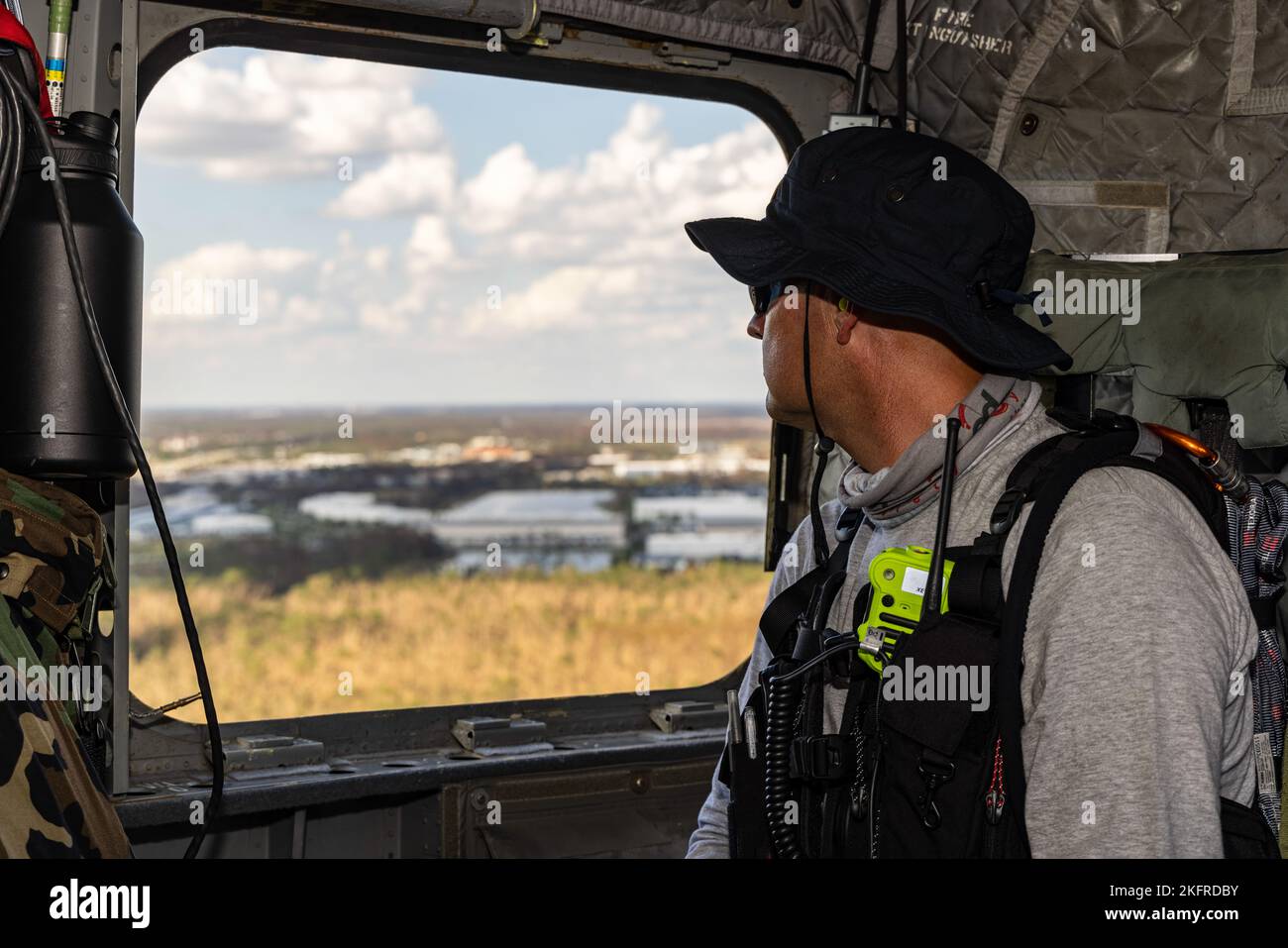 A member of the Miami-Dade Fire Rescue - Florida Task Force 1, surveys ...