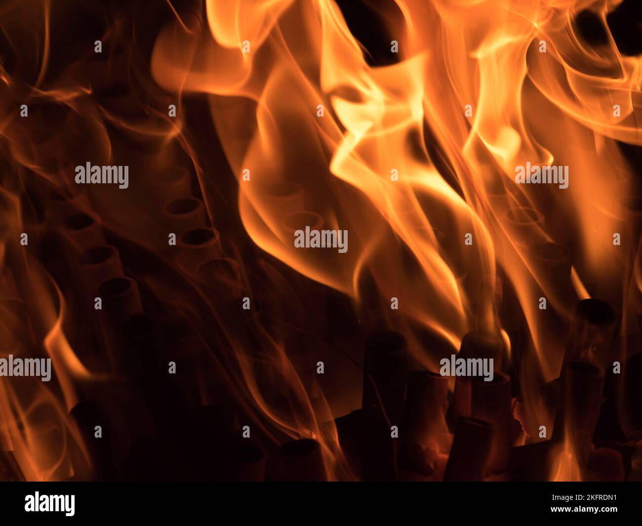 Firework mortor repeater tubes on fire with flames close-up Stock Photo ...