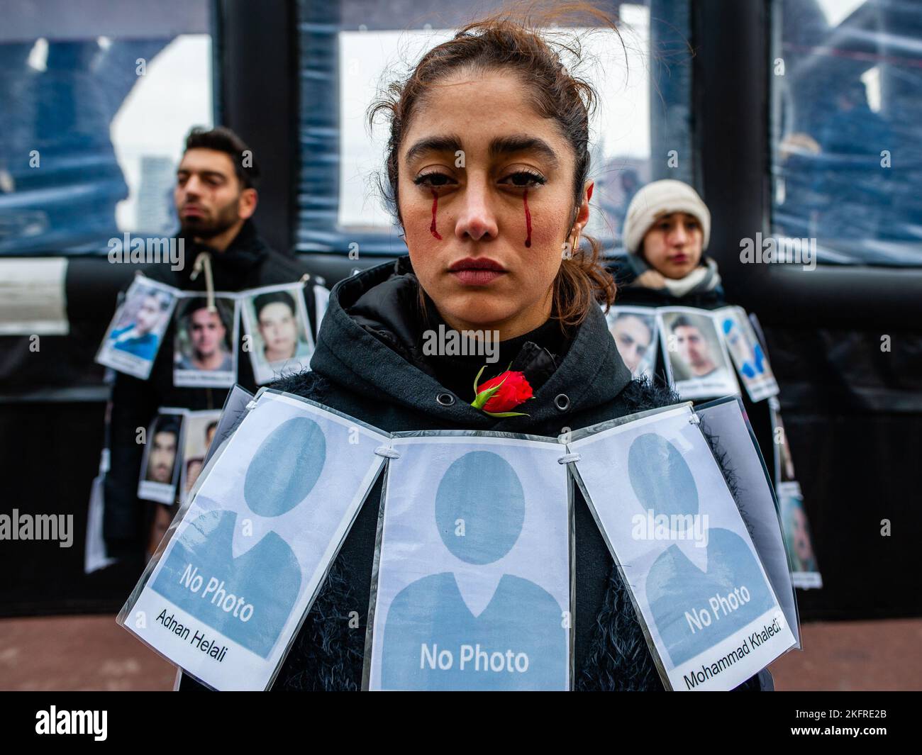 The Hague, Netherlands. 19th Nov, 2022. A Iranian woman seen faking ...