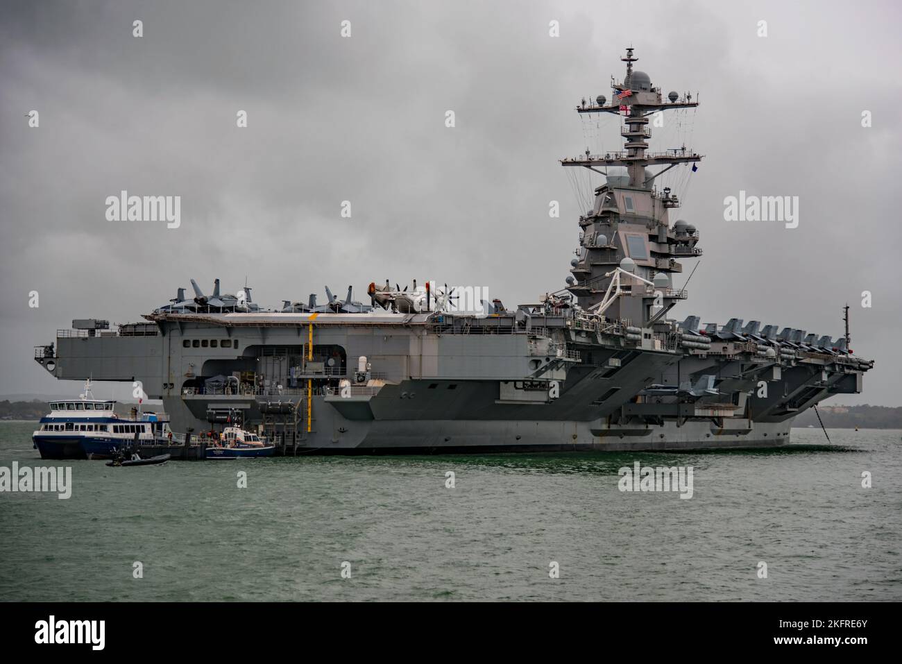 The US Navy aircraft carrier USS Gerald R Ford (CVN 78) at anchor in ...
