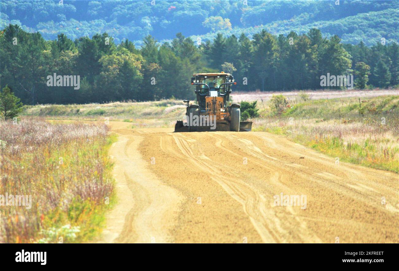A grader operator with the installation grounds/snow-removal contractor ...