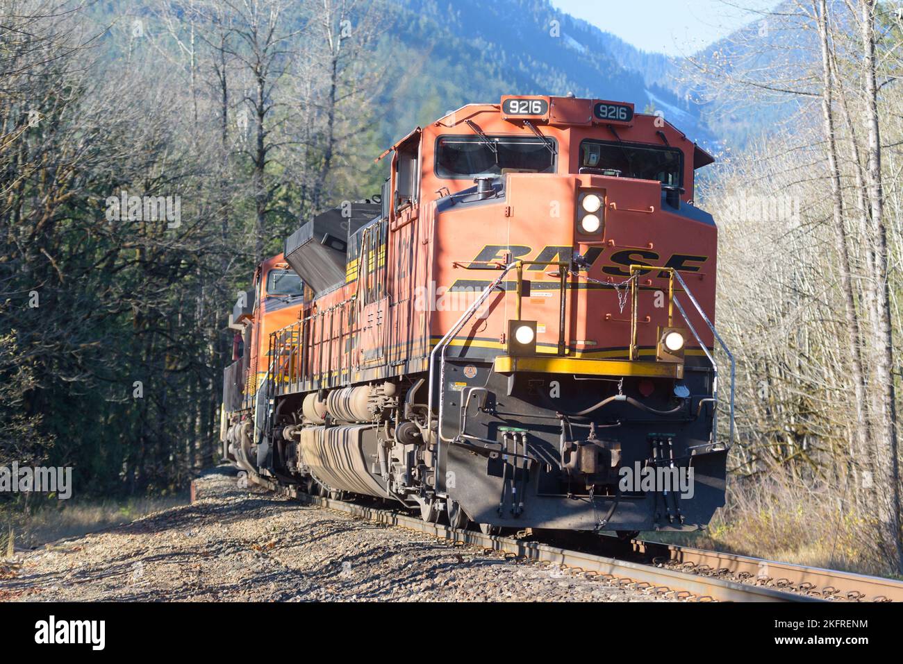 Skykomish, WA, USA - November 18, 2022; BNSF freight train working through the Cascade Mountains ...