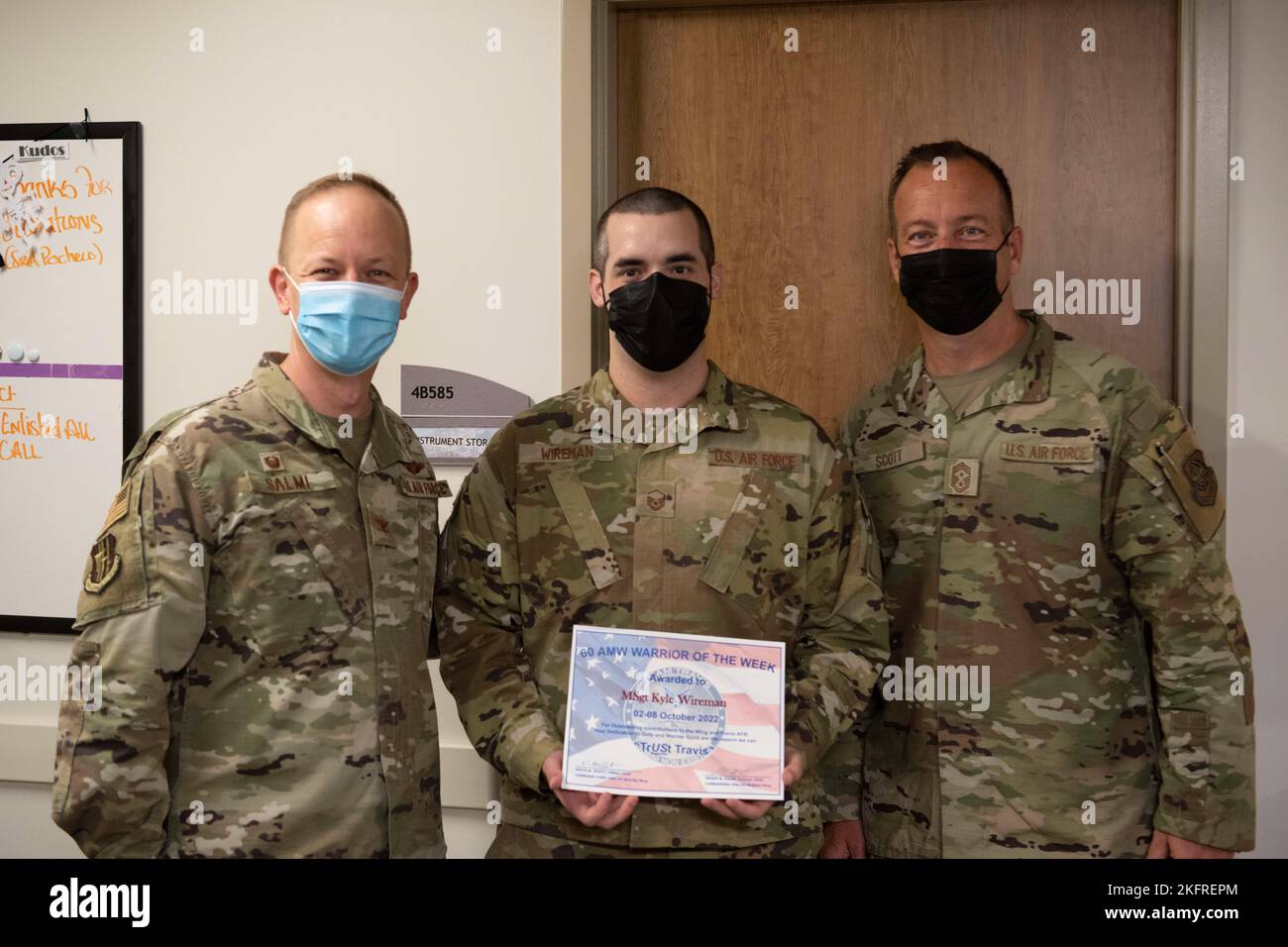 U.S. Air Force Col. Derek Salmi, left, 60th Air Mobility Wing commander ...