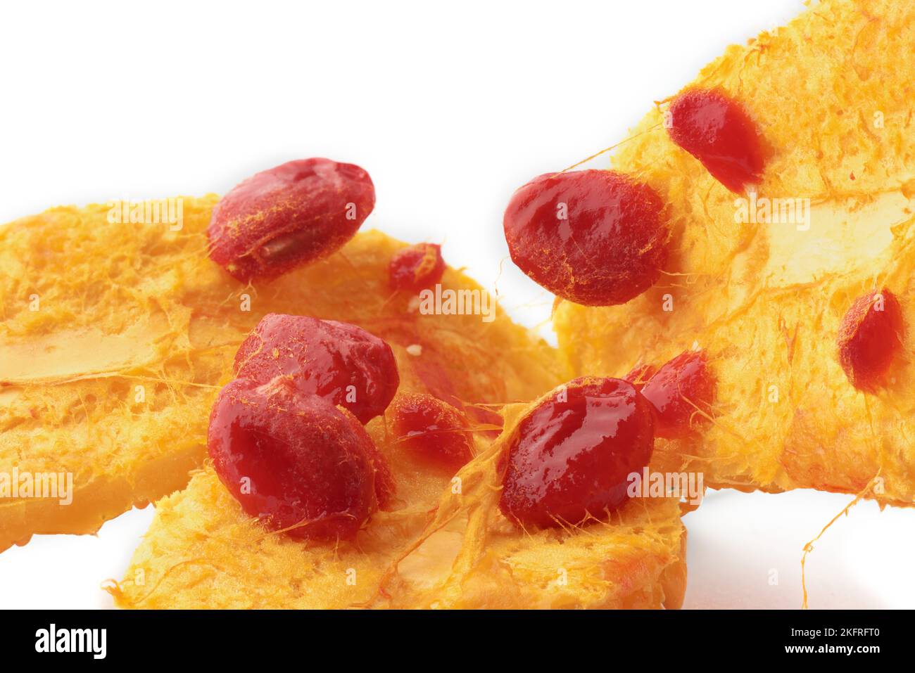 close-up macro view of over ripe and burst out bitter gourd with seeds ...