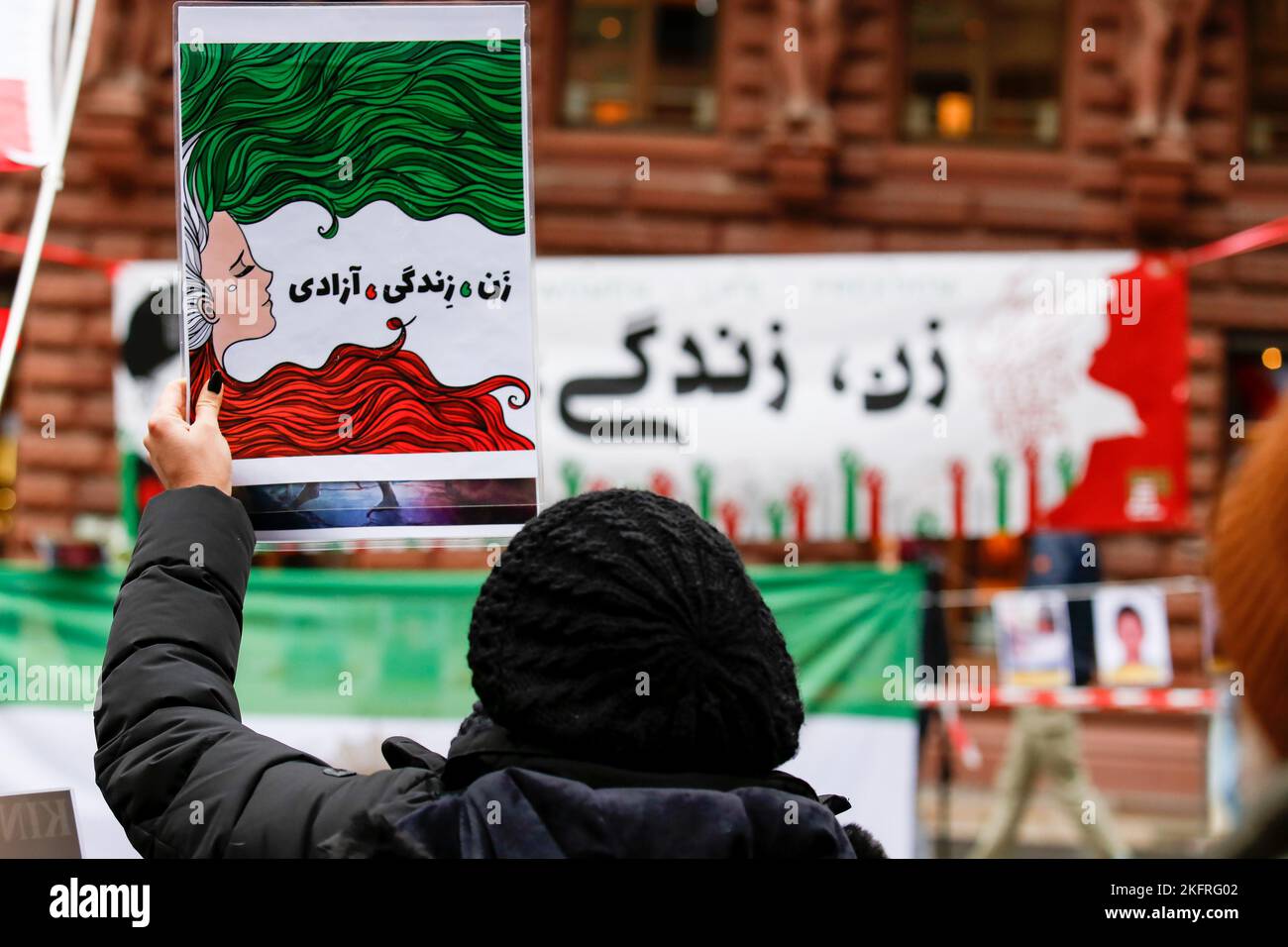 A protester holds a placard expressing her opinion during the ...