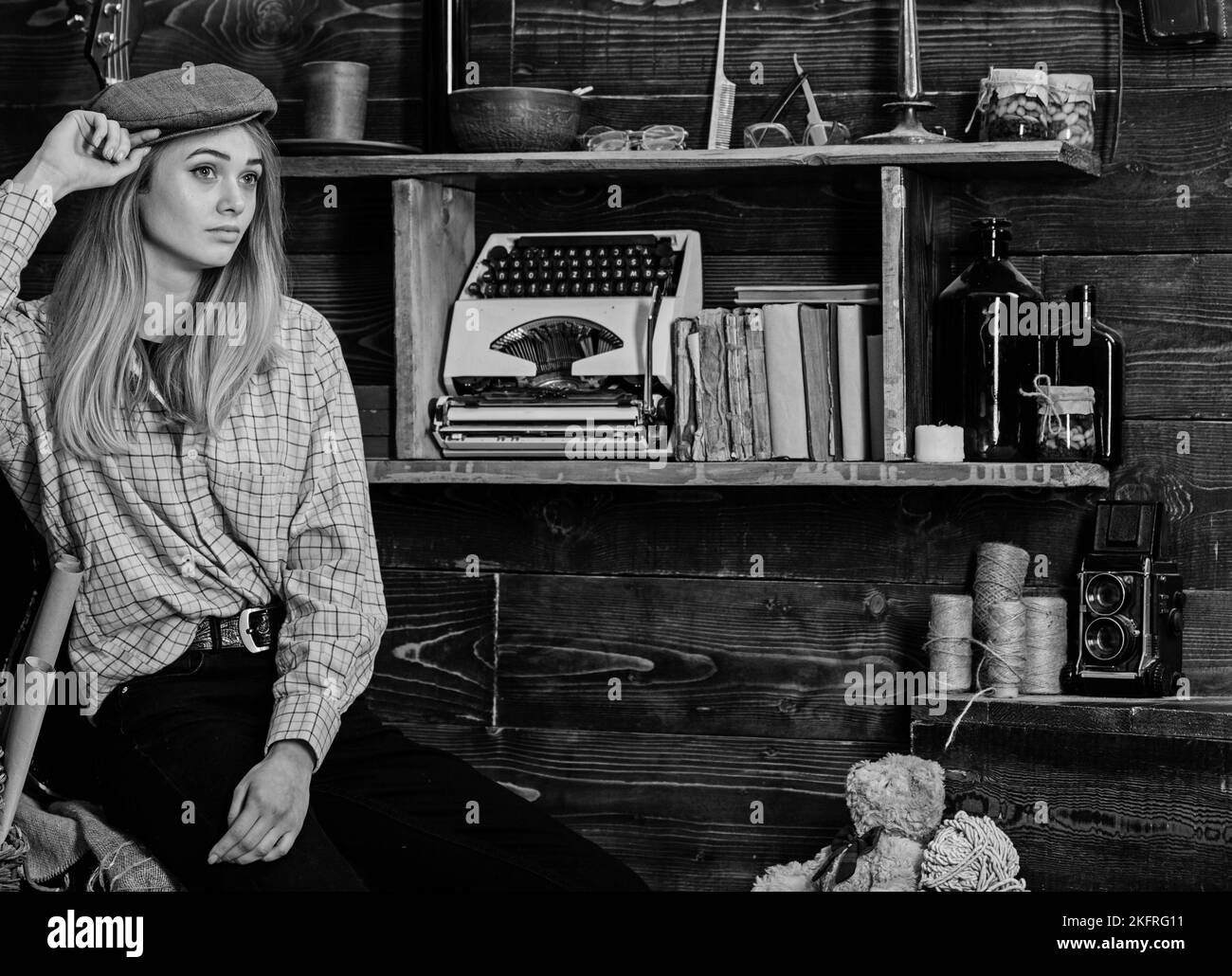 Tomboy concept. Girl tomboy spend time in house of gamekeeper. Lady on ...