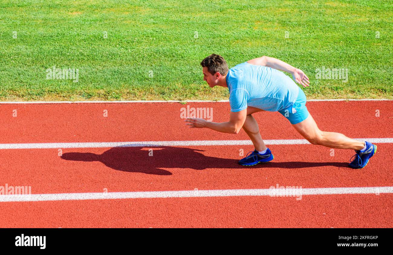 Boost speed concept. Man athlete runner push off starting position ...