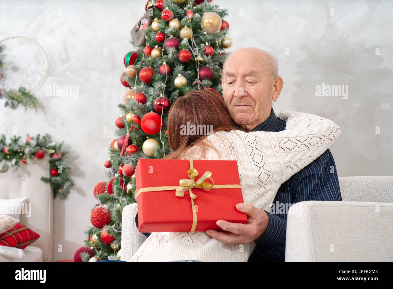 great grandfather and great granddaughter. grandfather getting ...
