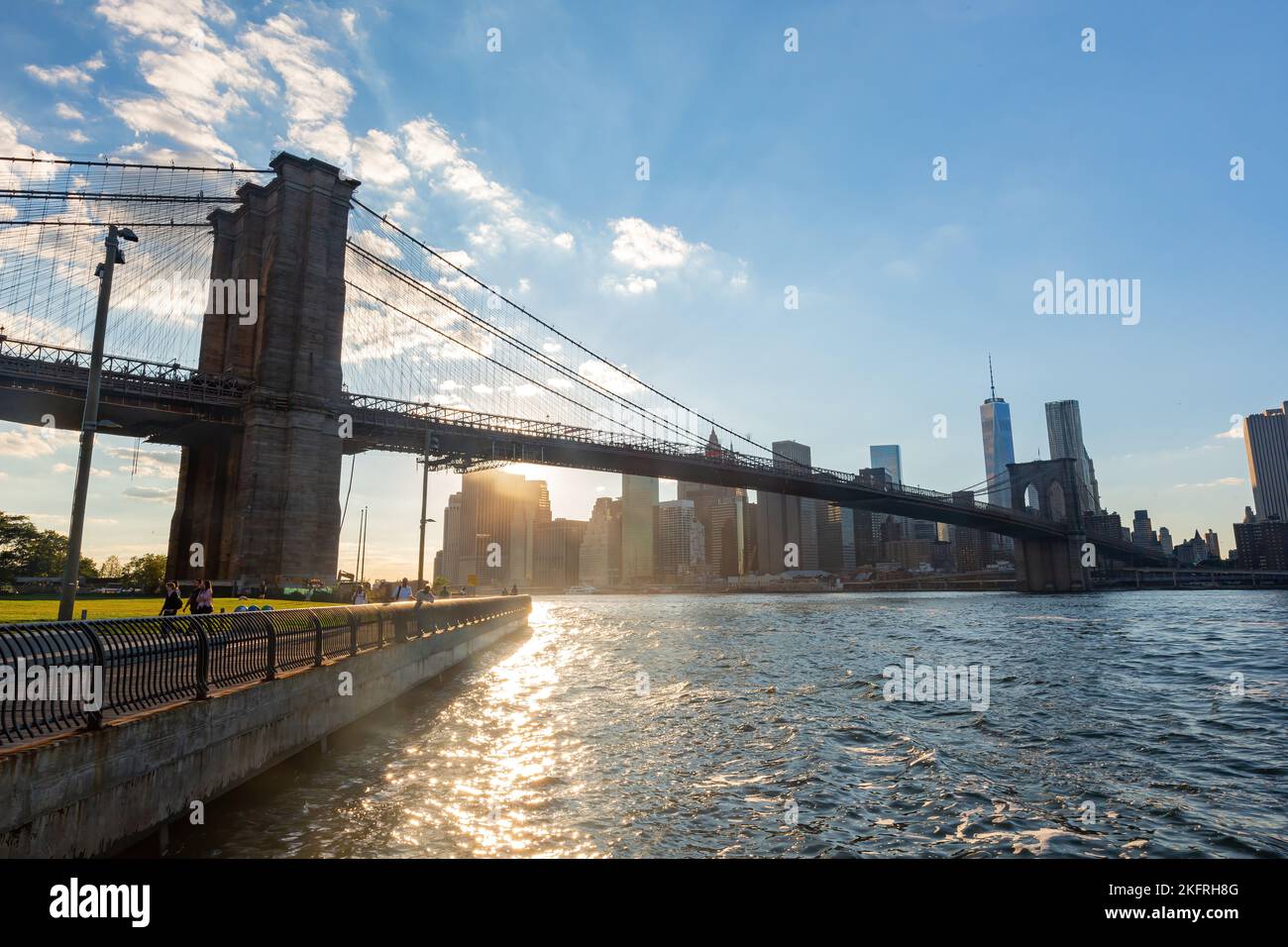 Sunset of the Brooklyn Bridge and New York City skyline at New York ...