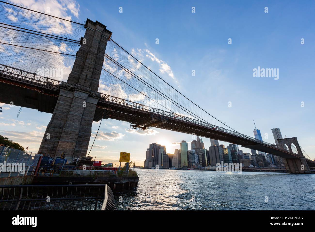 Sunset of the Brooklyn Bridge and New York City skyline at New York ...