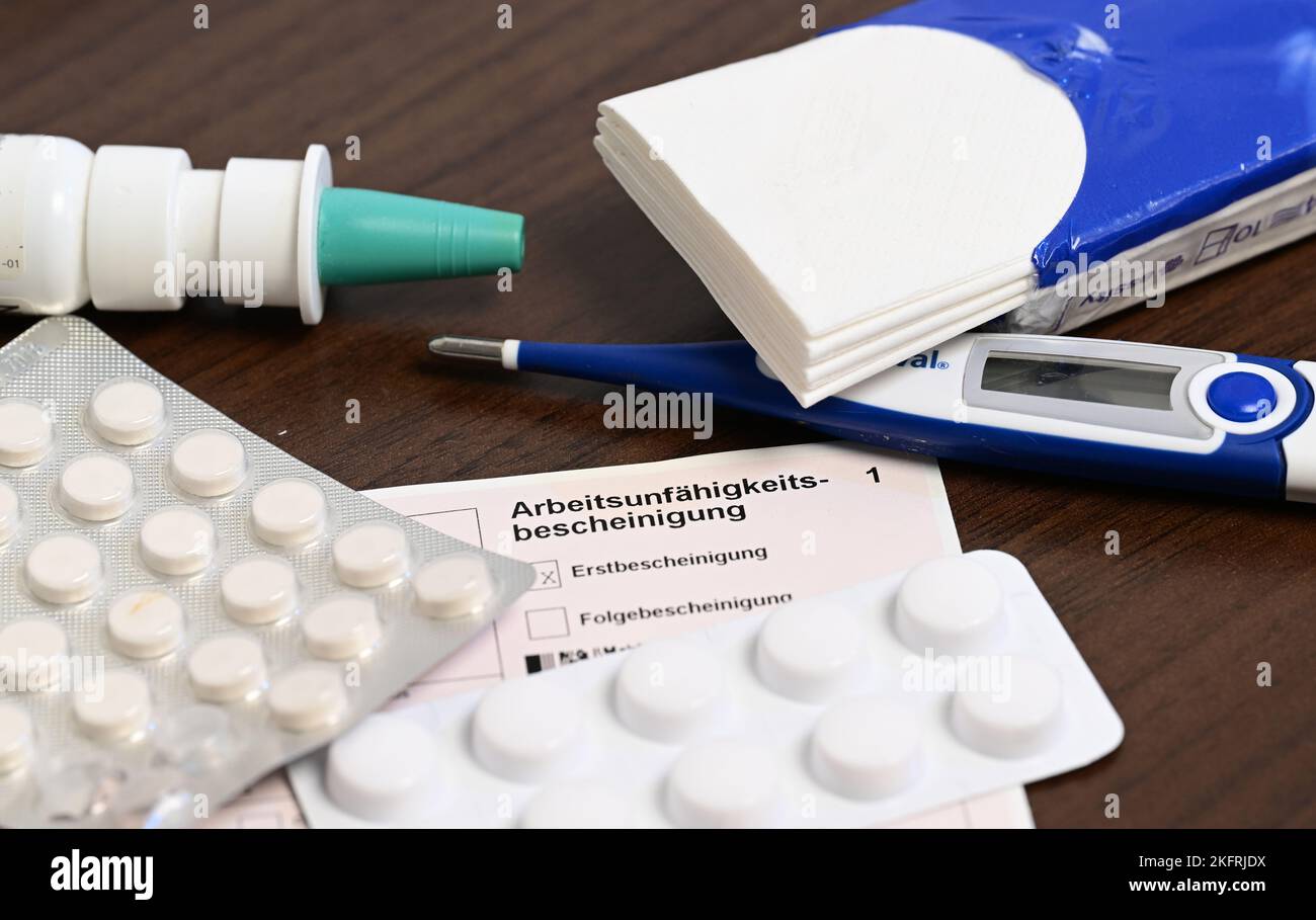Stuttgart, Germany. 18th Nov, 2022. A fever thermometer, medication and ...