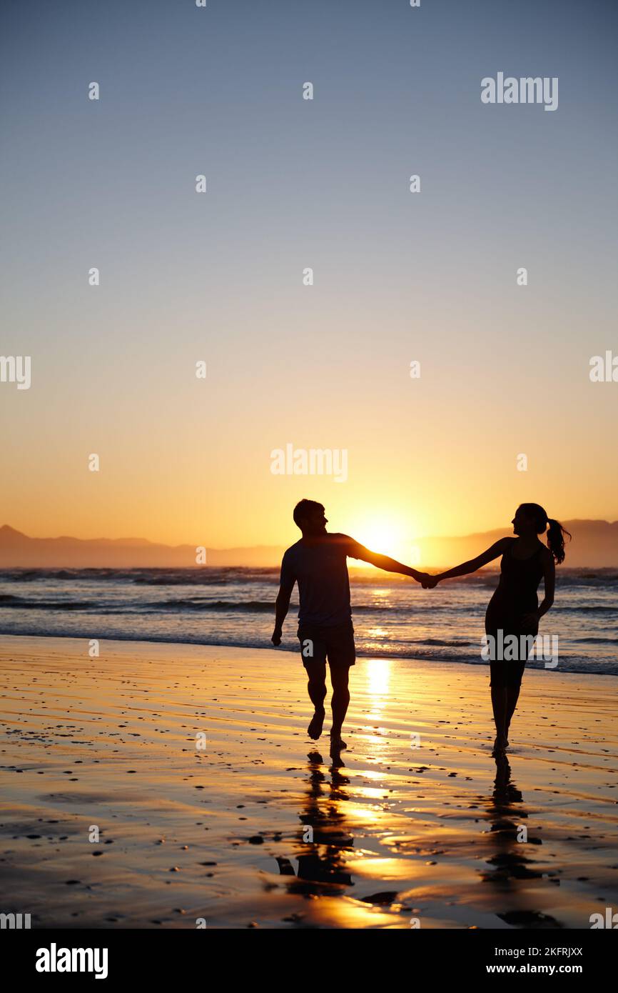 Two People Holding Hands Silhouette