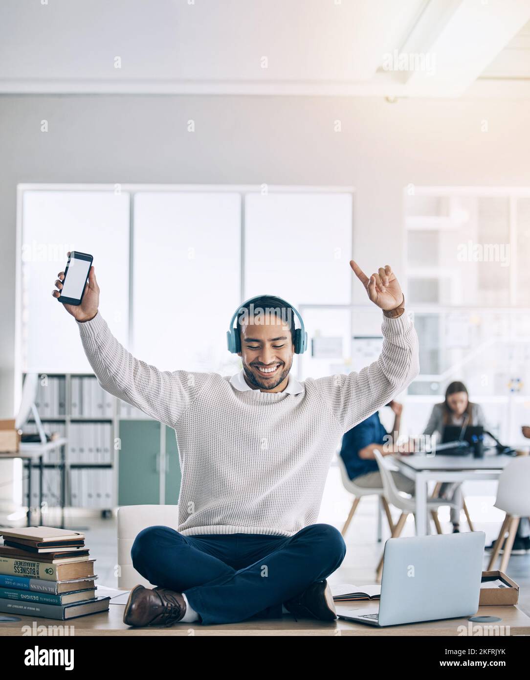 Music, phone and businessman with headphones on desk listening to audio ...