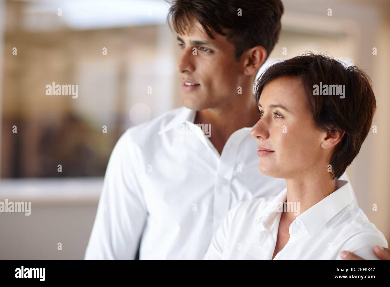 Planning their future together. a loving couple looking away ...