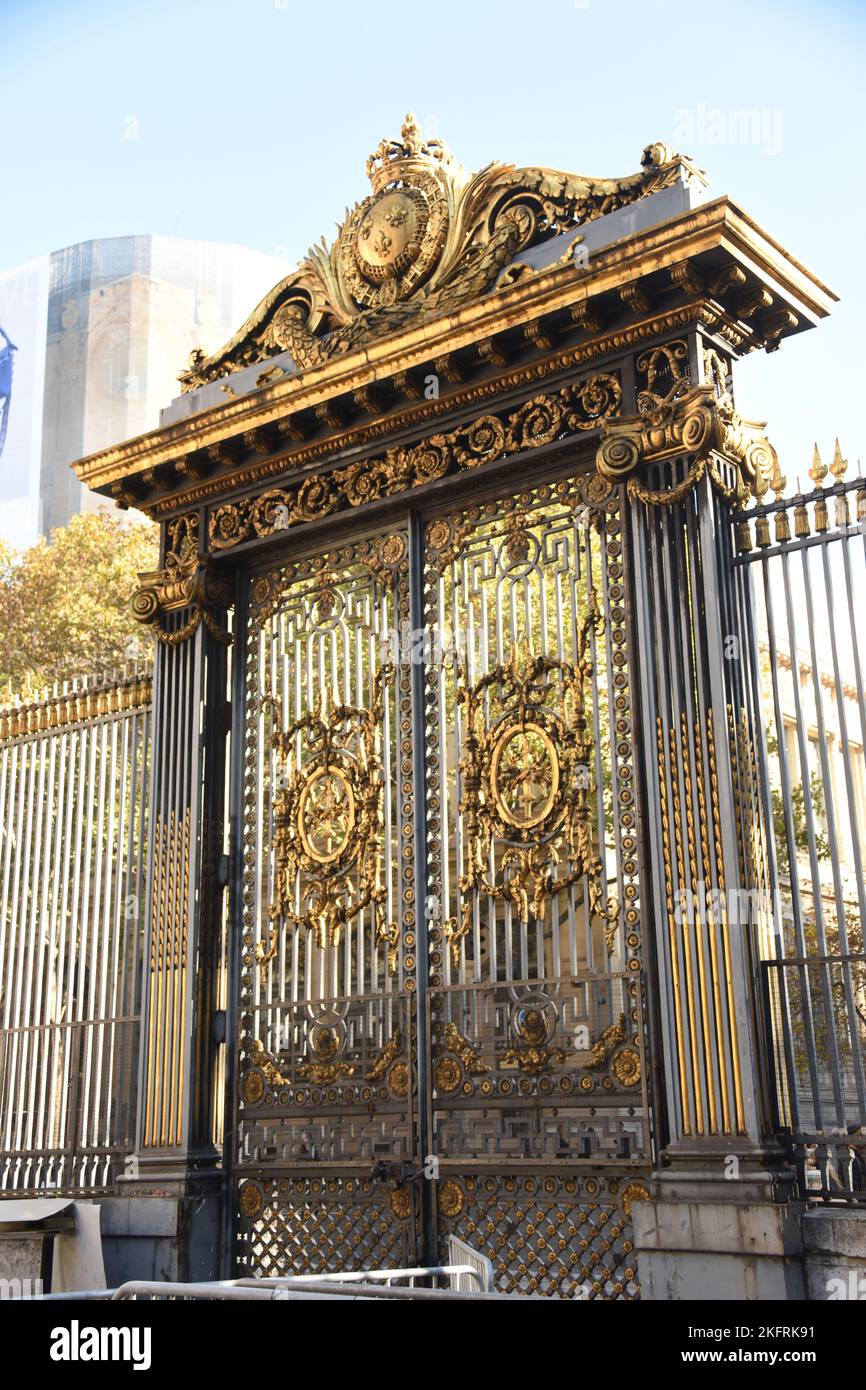 A vertical shot of Palais de Justice de Paris main gate, a courthouse ...