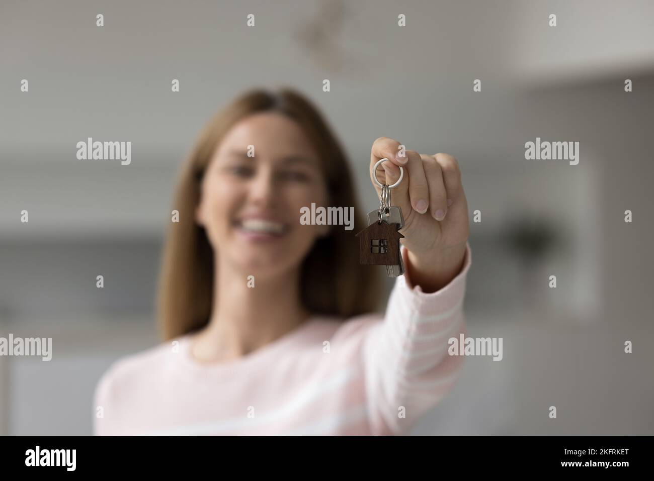 Woman showing bunch of keys on camera, close up Stock Photo - Alamy