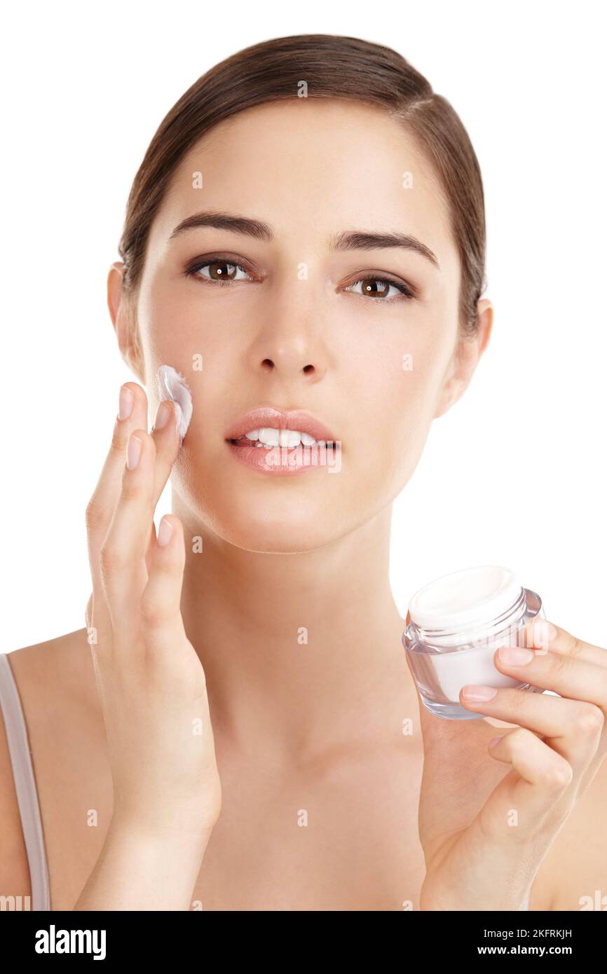 Its important to moisturize. Cropped portrait of a beautiful young ...