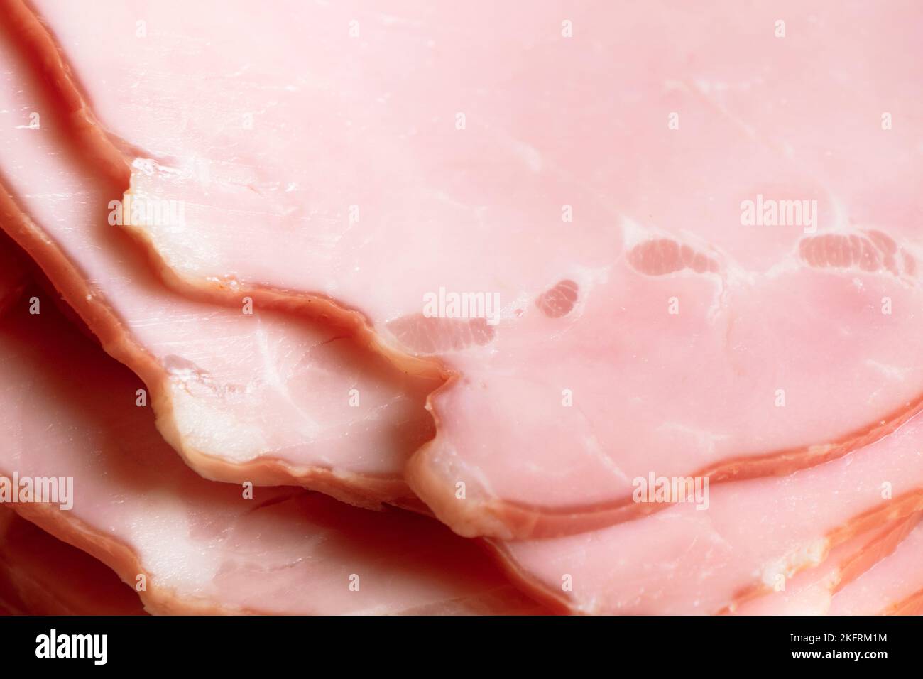 Front view of sliced smoked ham meat texture background. Raw Macro shot ...