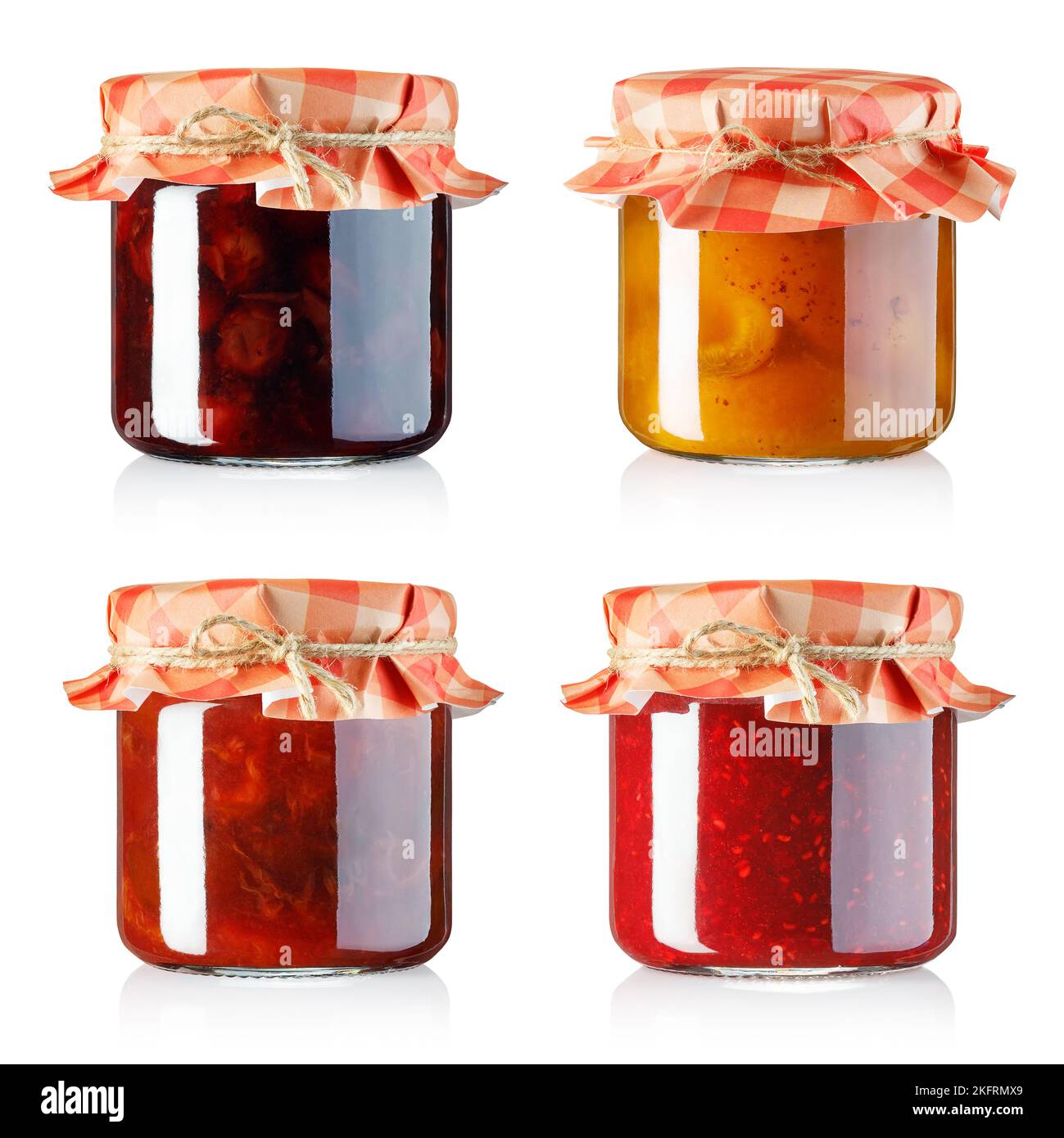 collection of fruits jam in small glass jars covered with paper ...