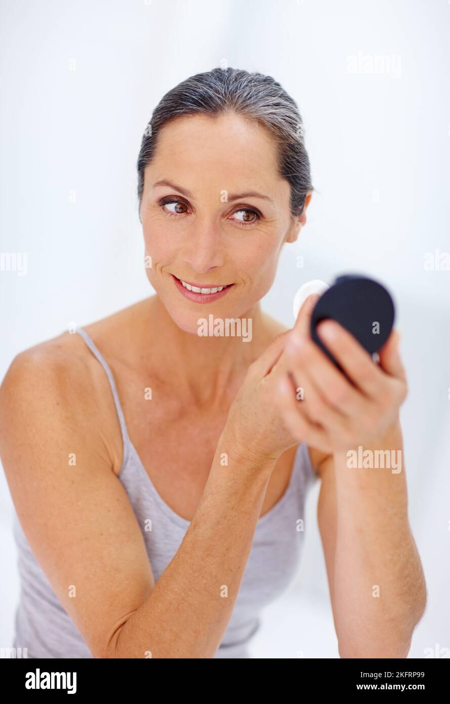 Keeping her skin looking great with good beauty habits. an attractive ...