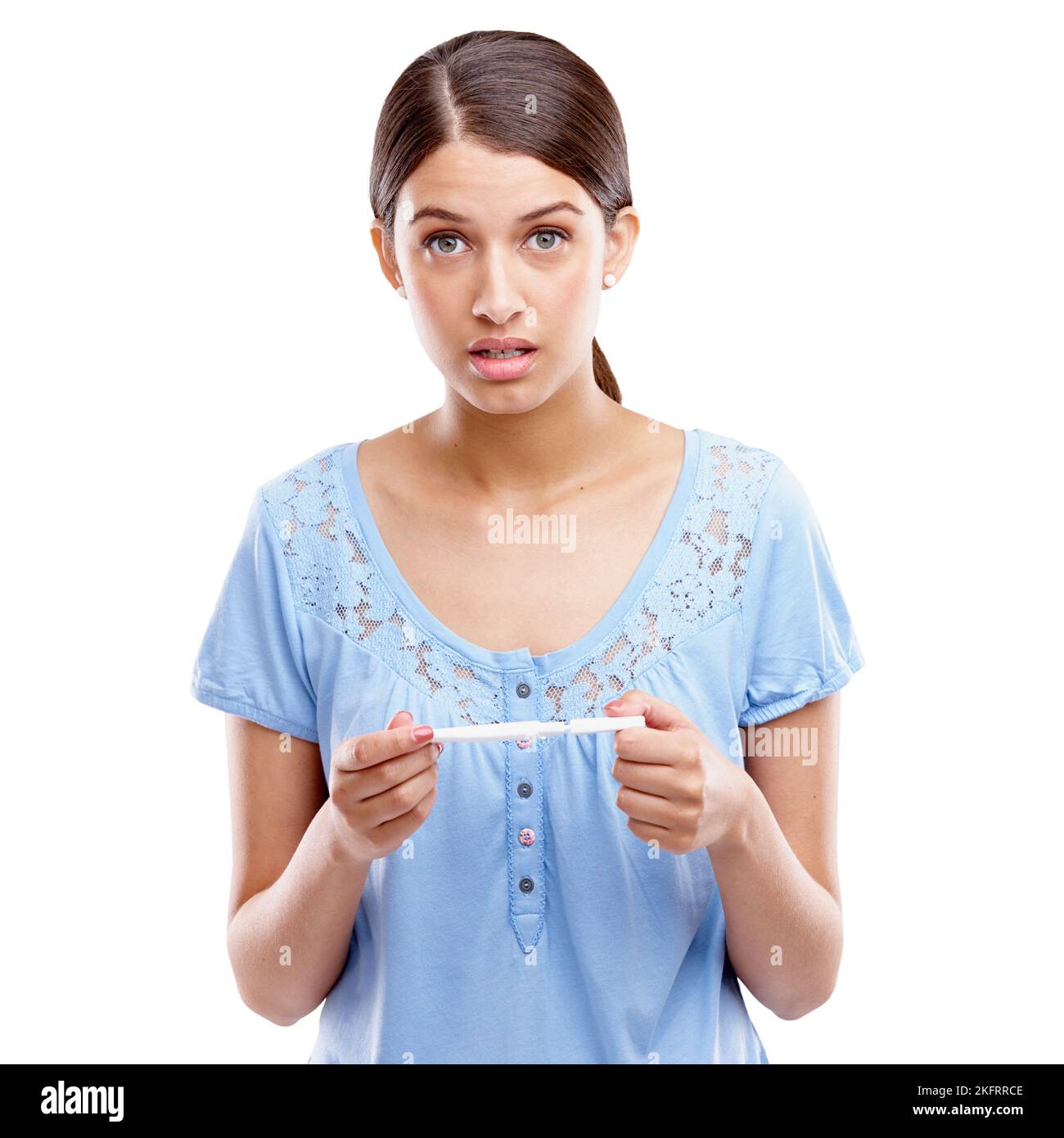 Im too scared to look...Studio portrait of a young woman looking ...