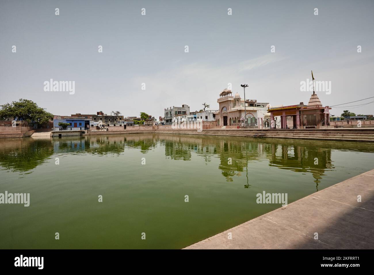 Sacred pool. Radha Kund, a sacred pool in India, with mythological ...