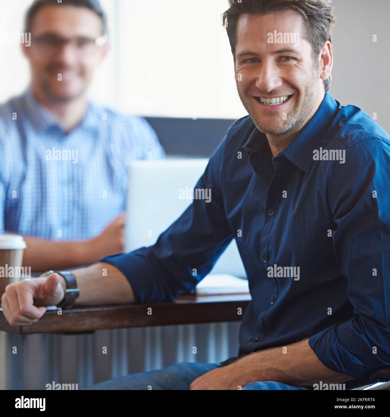 Its been a productive day. Portrait of a two colleagues having a talk ...