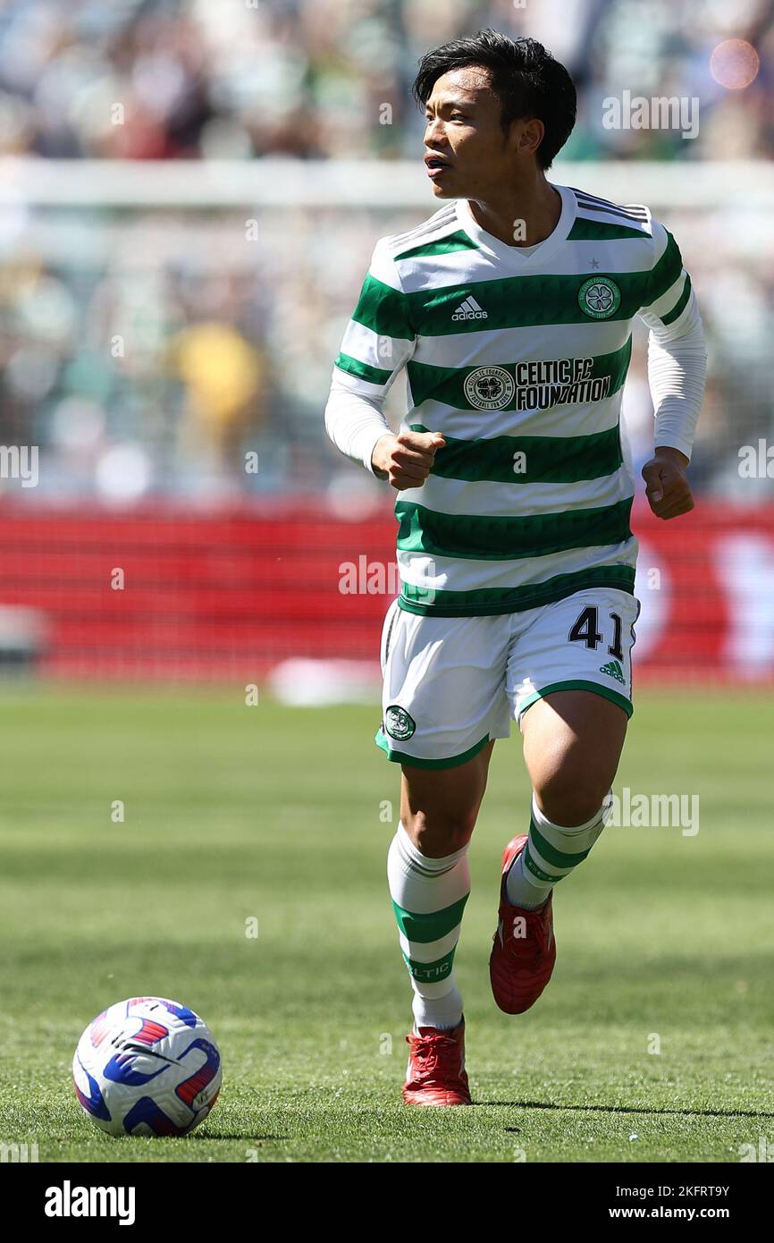 Reo Hatate of Celtic FC dribbles during the Sydney Super Cup match ...