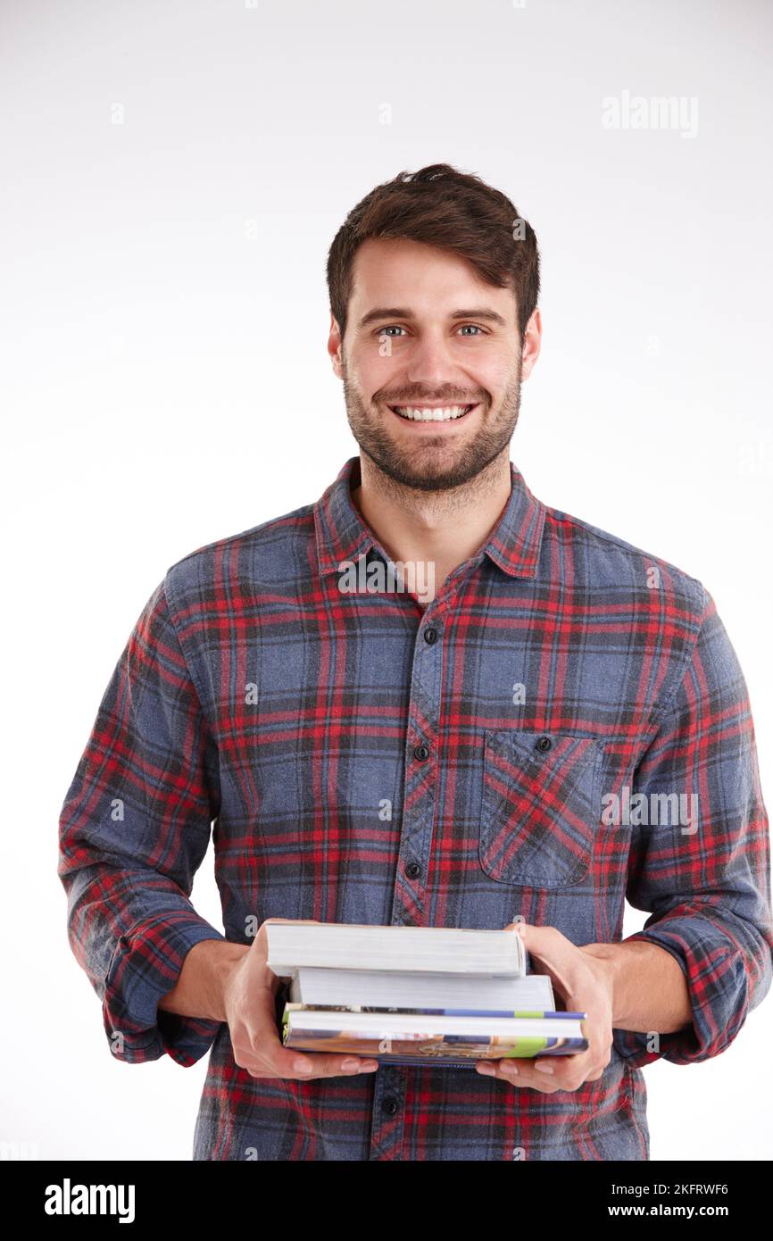 Man holding books hi-res stock photography and images - Alamy
