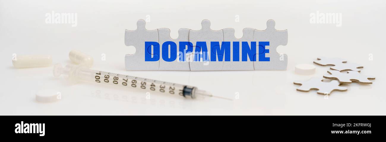 Medicine and health concept. On a white background lie a syringe, pills ...