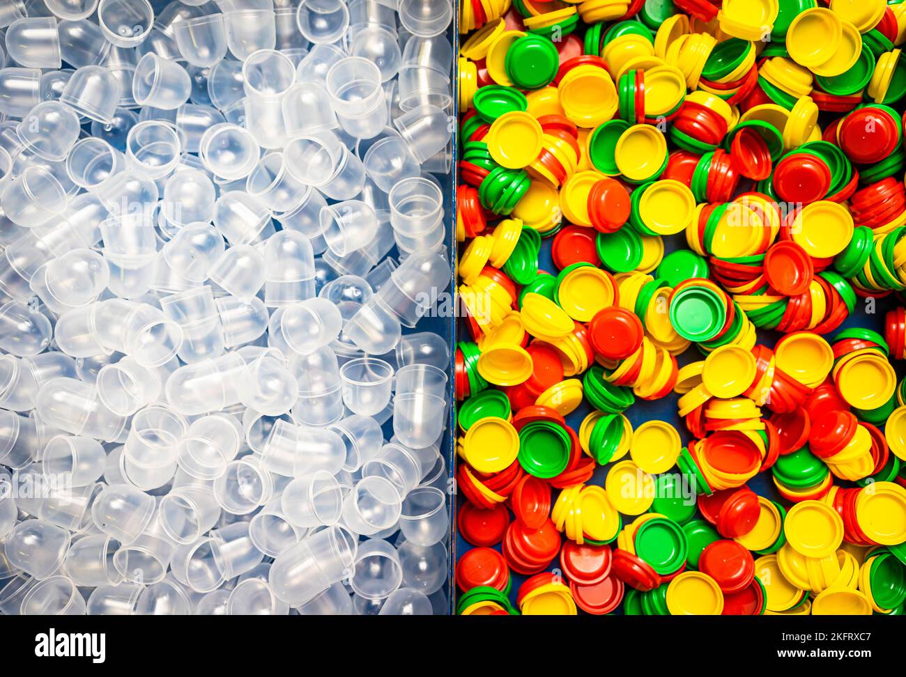 Image of plastic caps and plastic boxes for little goods separate in a ...