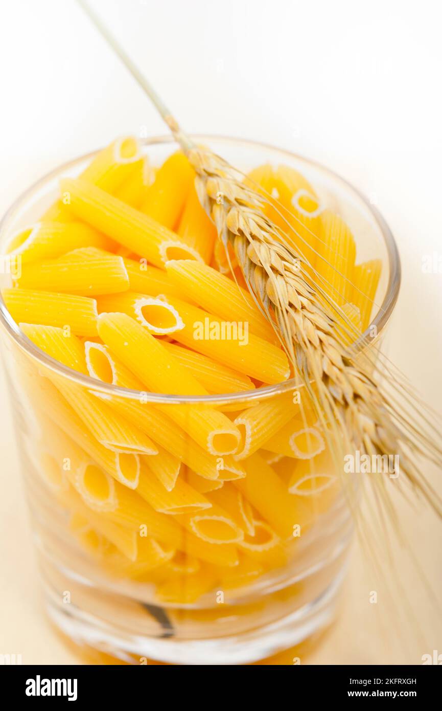 short Italian pasta penne with durum wheat grains Stock Photo - Alamy