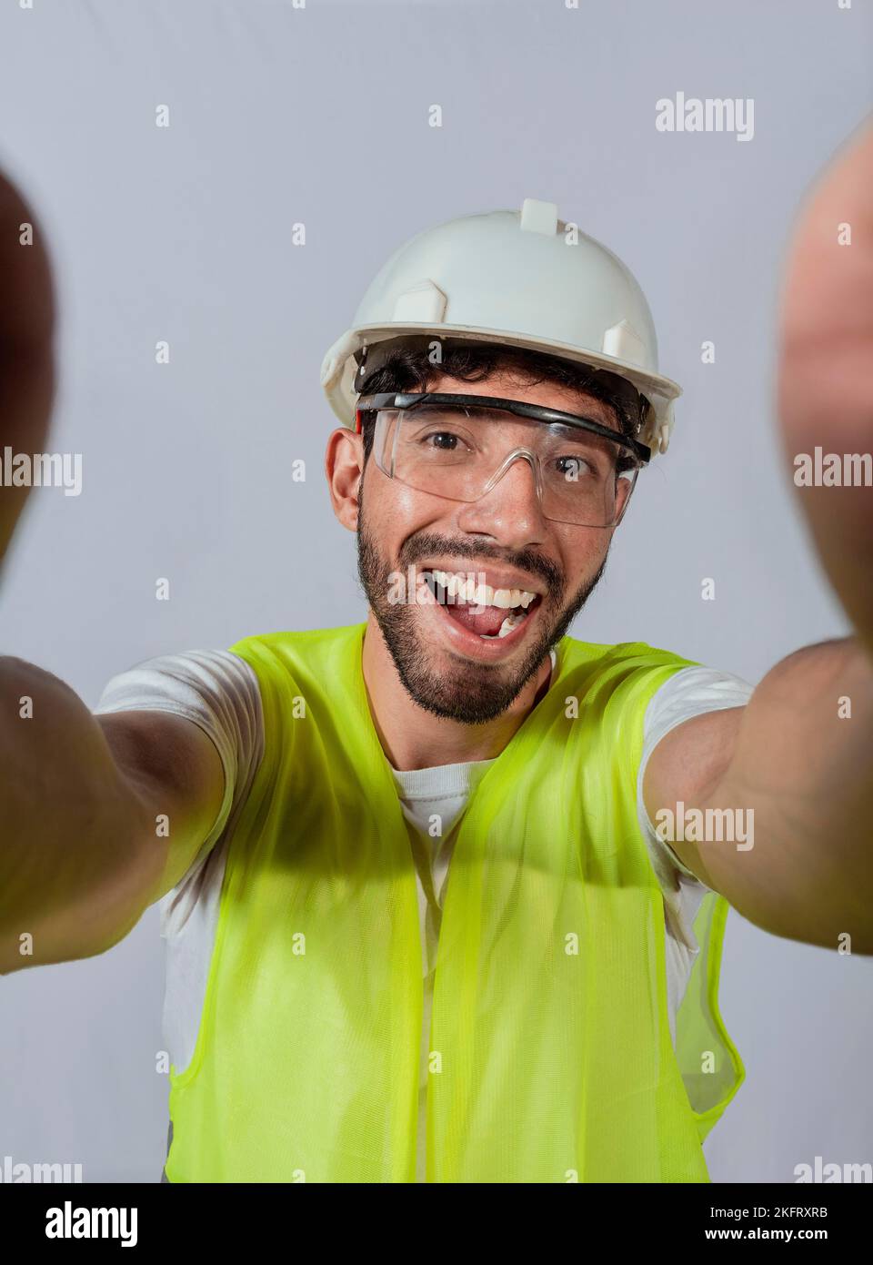 Funny builder engineer taking a selfie isolated, Engineer taking a ...