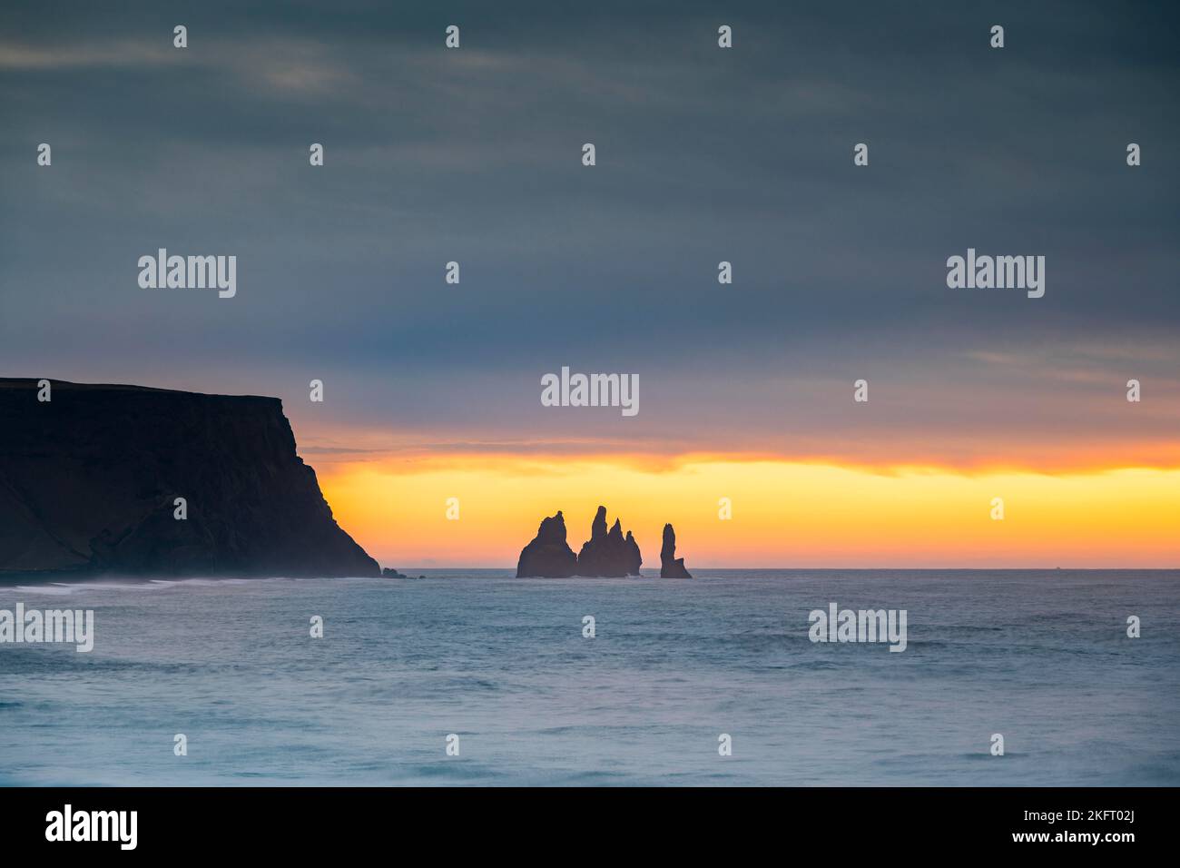 View from Cape Dyrhólaey, rock formations Reynisdrangar and Mount ...