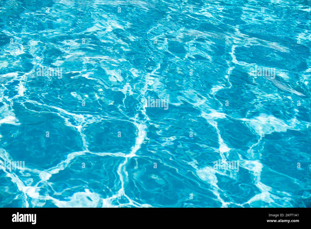 Water in swimming pool, background with high resolution. Wave abstract or rippled water texture ...