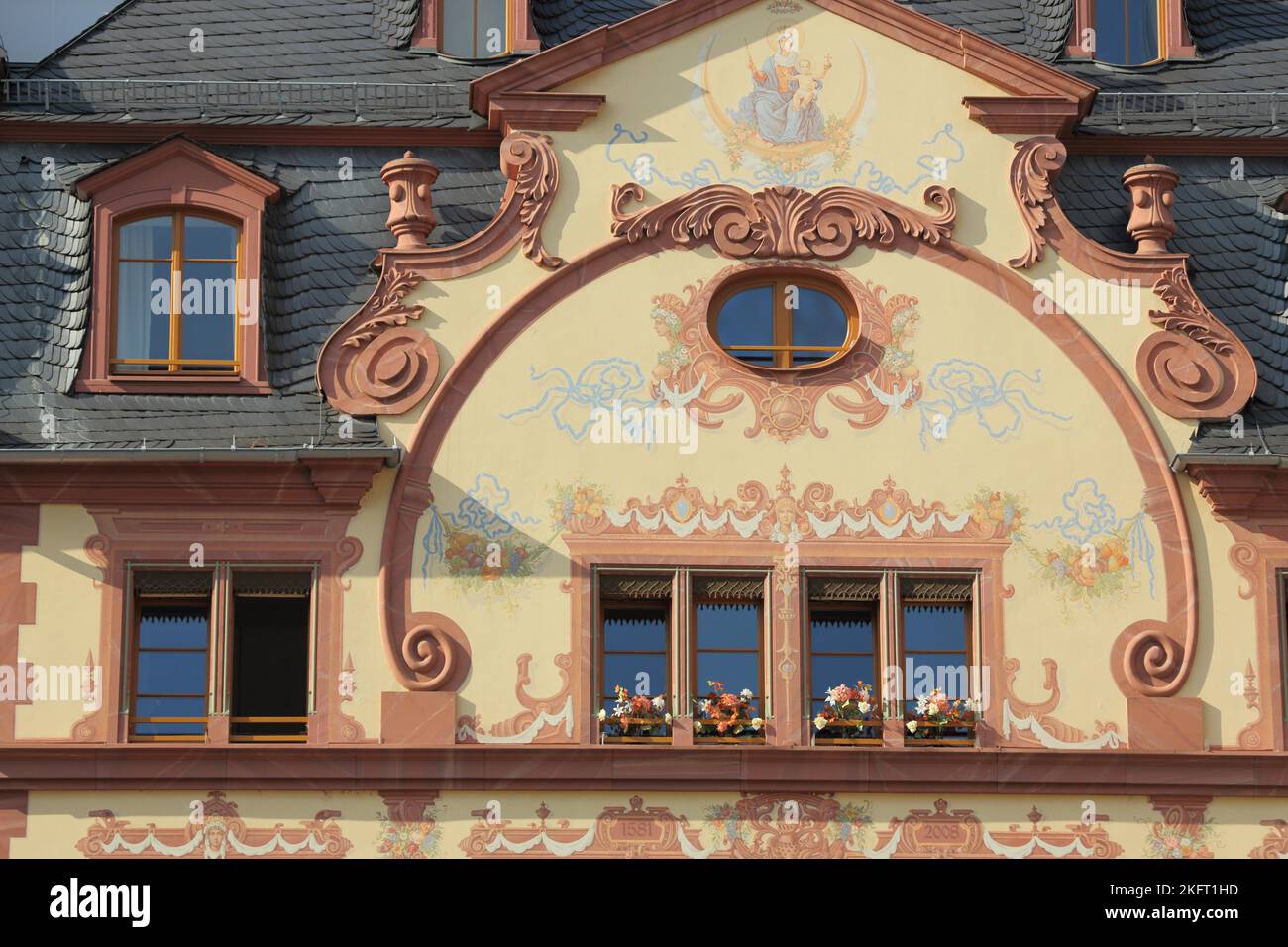 Detail of historic house with ornaments and mural on the market, tail ...