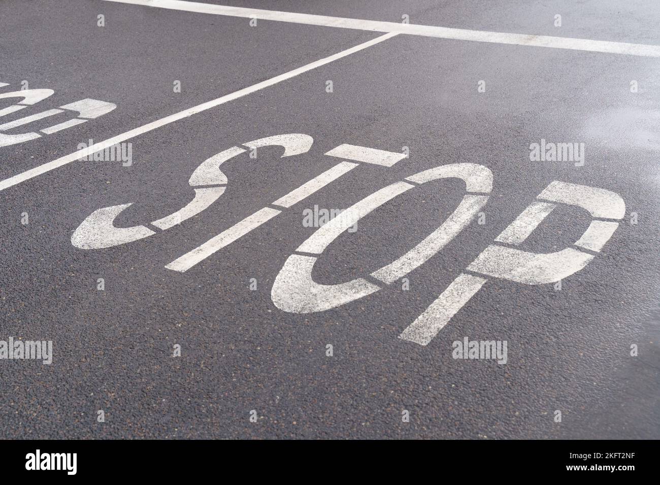 Road markings. Road markings on the asphalt - line and text Stop Stock ...