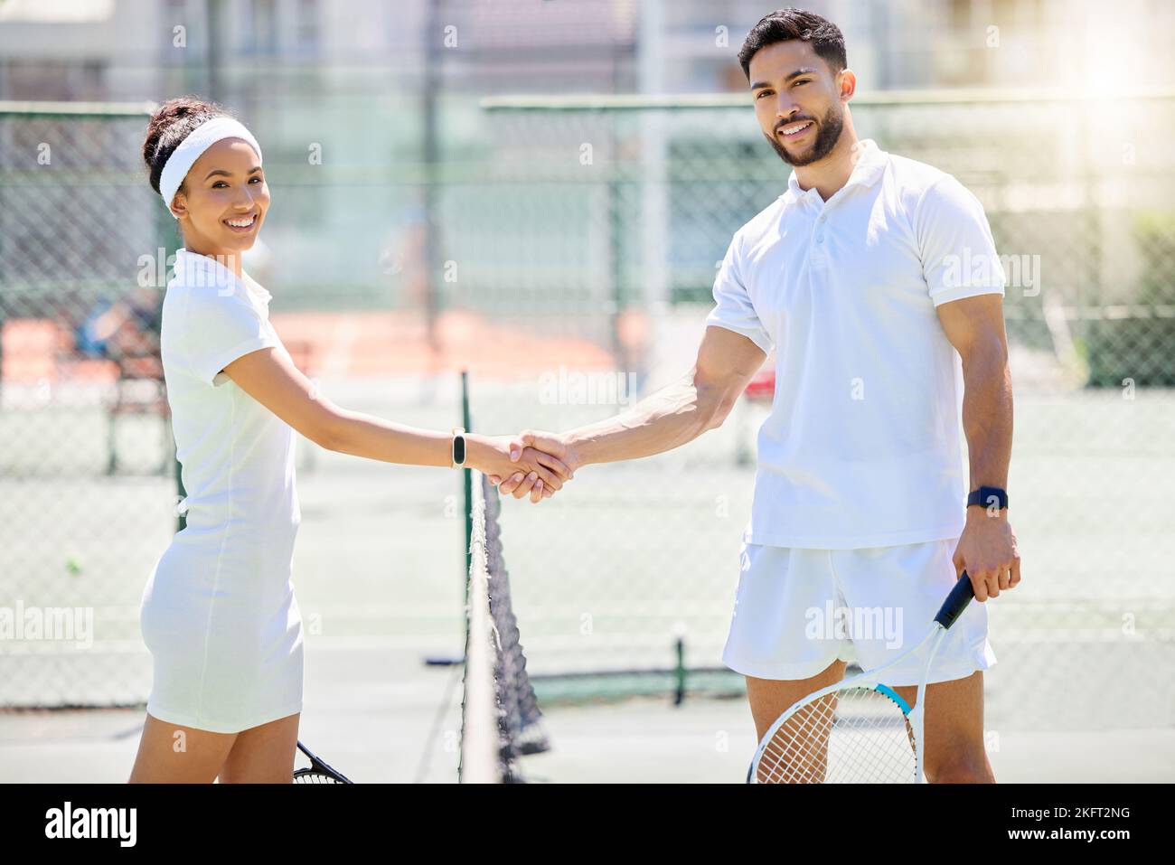 Game, tennis and portrait of athletes shaking hands for success ...