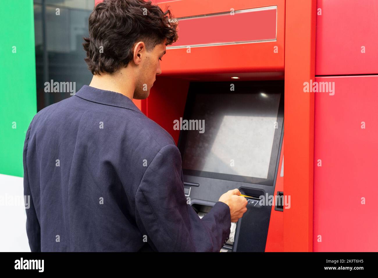 Male at atm hi-res stock photography and images - Alamy
