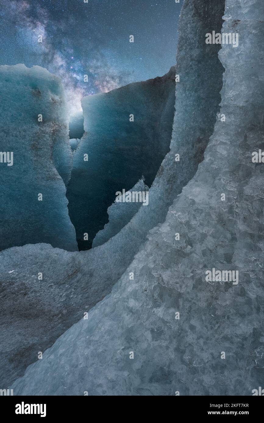 Breathtaking icy rocks of Vatnajokull National Park illuminated with ...