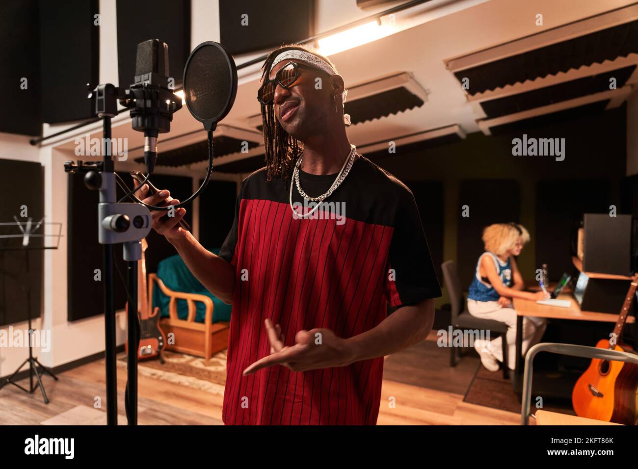 Singer neck chain hi-res stock photography and images - Alamy