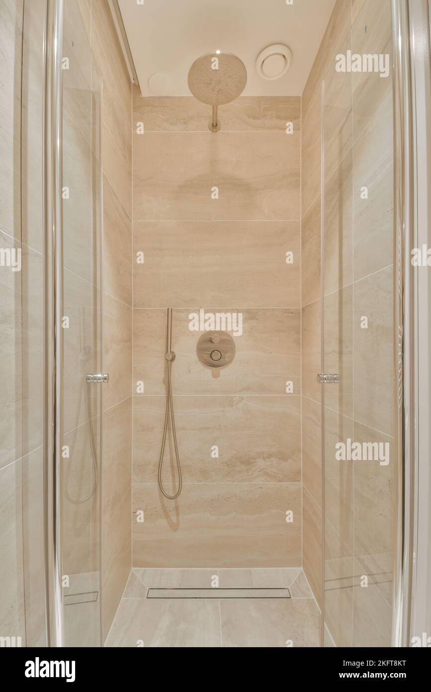 Interior of a modern shower with tile walls Stock Photo - Alamy