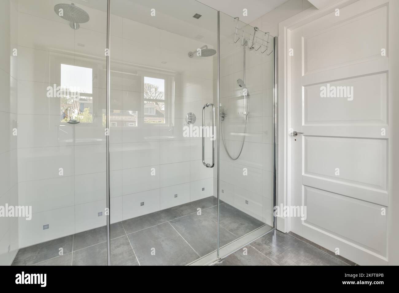 Interior of a modern shower with white walls Stock Photo - Alamy