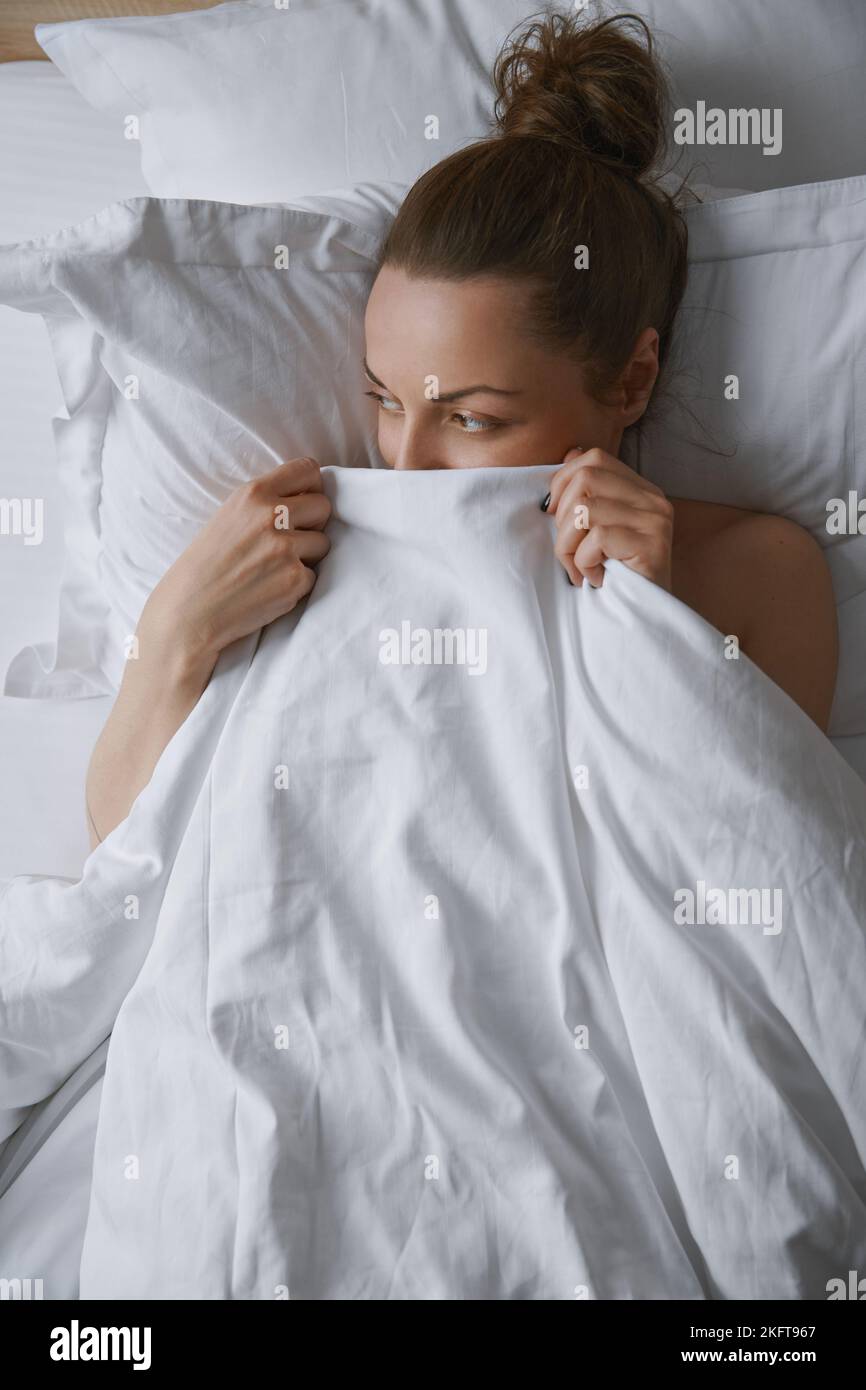 Peeking over bed sheet hi-res stock photography and images - Alamy