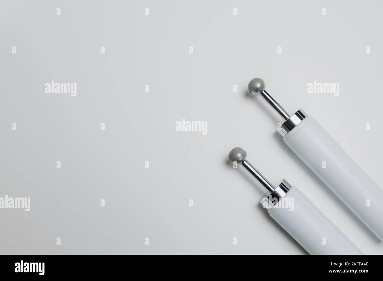 Microcurrent equipment close-up on white table with space Stock Photo ...