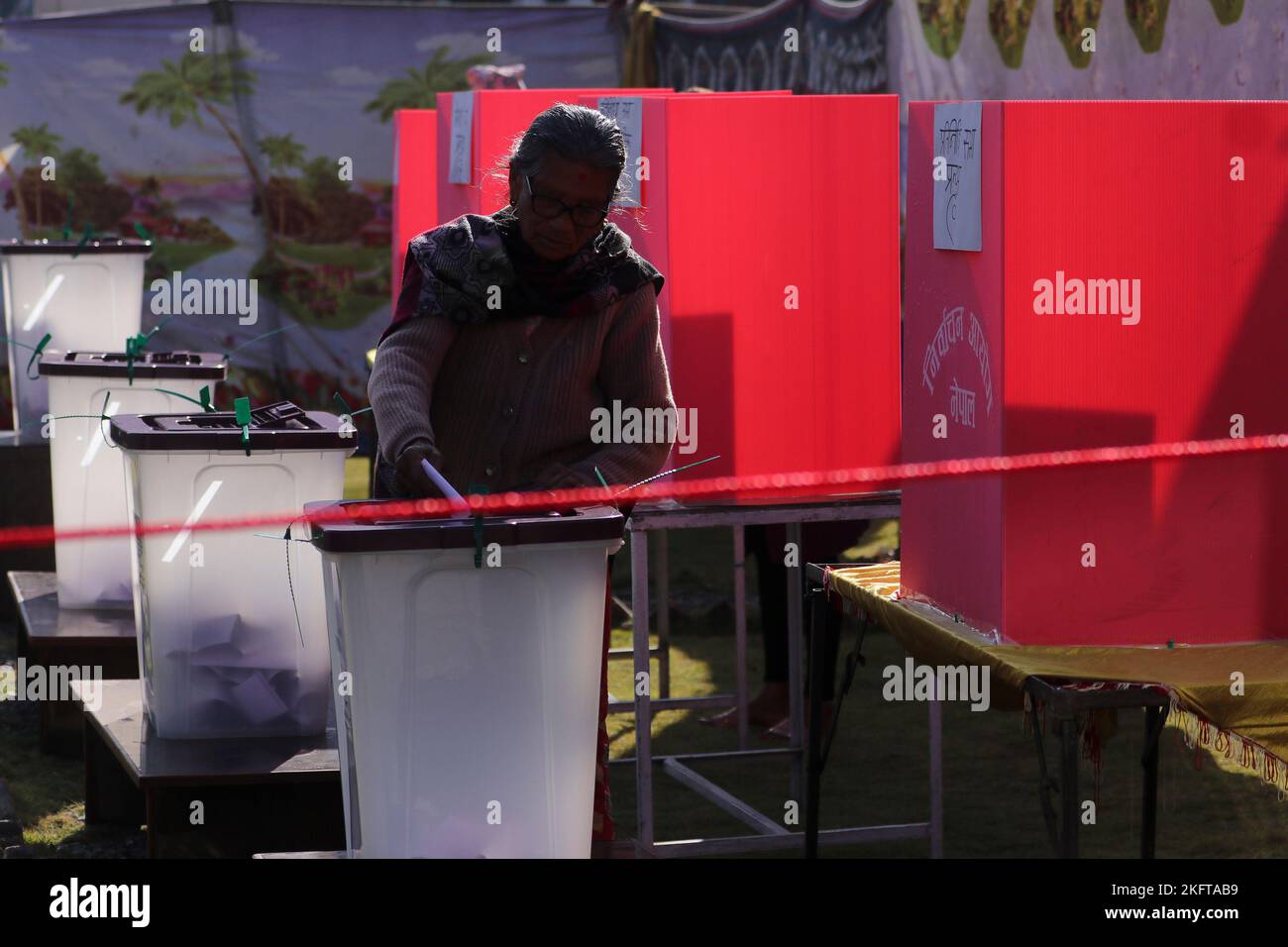 Kathmandu, NE, Nepal. 20th Nov, 2022. A woman casts her vote in the ...