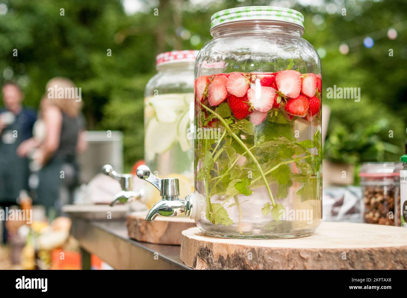 BBQ Outdoor with food preparations. People eating and dining outdoor ...